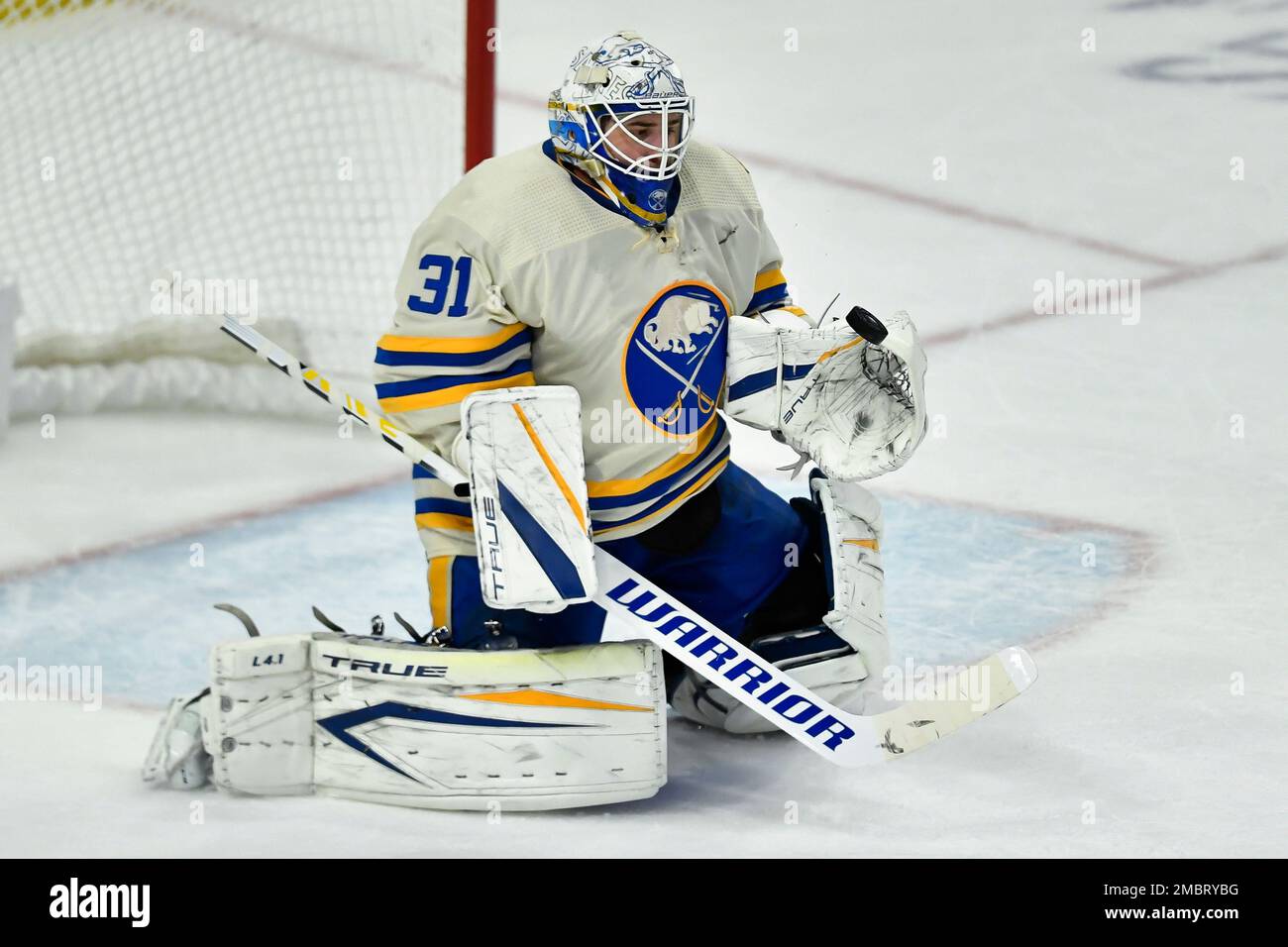 Buffalo Sabres goalie Dustin Tokarski makes a save during overtime of ...