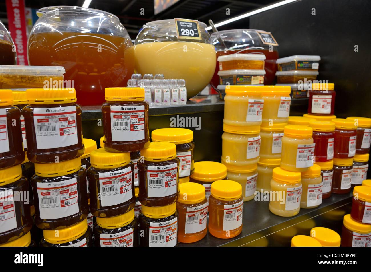 African honey display an tasting at the Carrefour Village Market ...