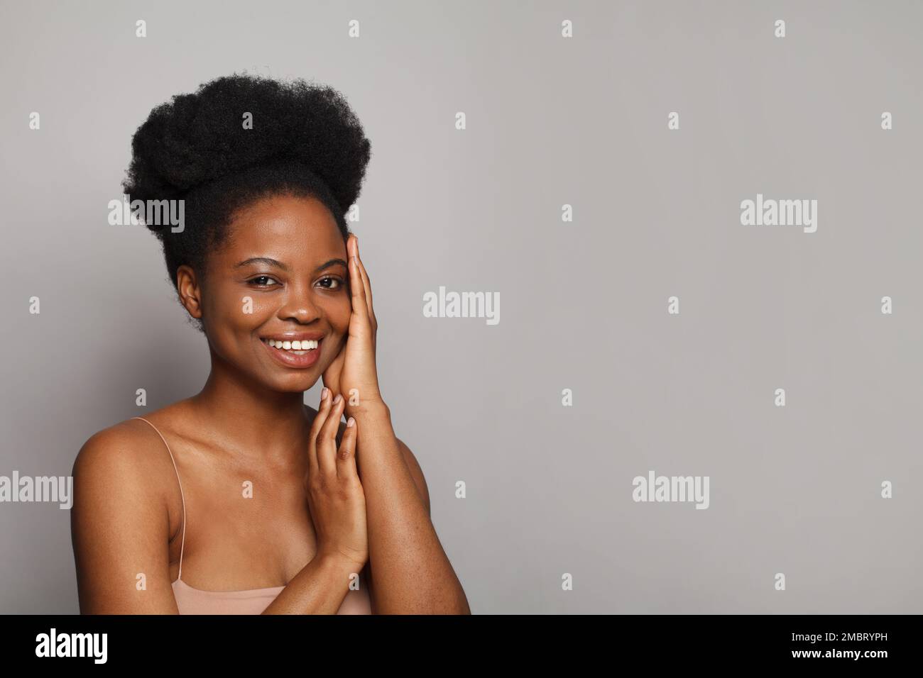 Beautiful model woman smiling on white background Stock Photo - Alamy