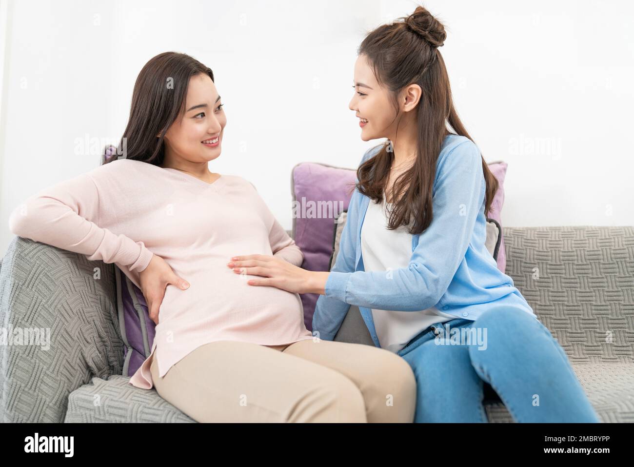 Pregnant women to family life Stock Photo - Alamy