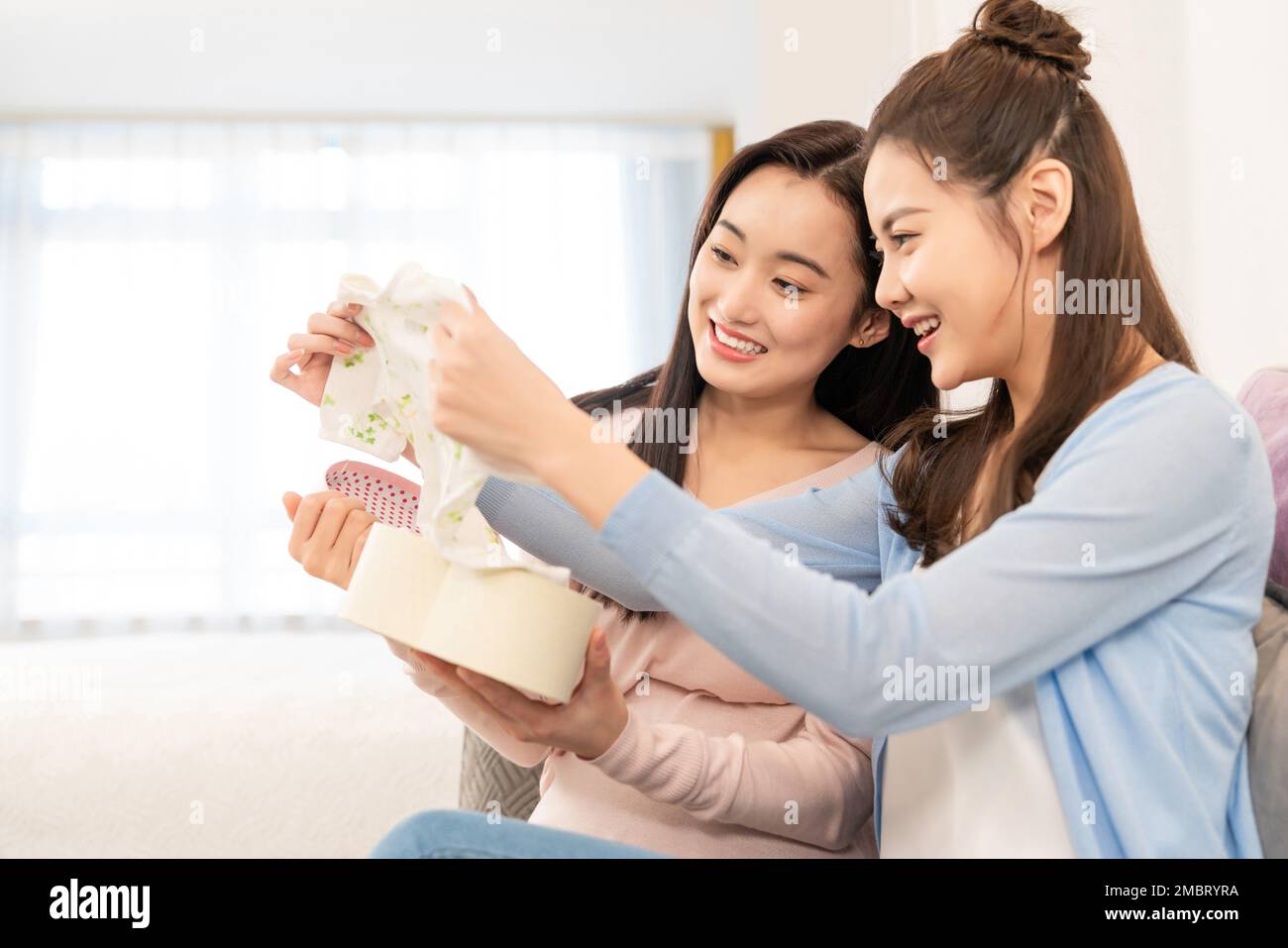 Pregnant women to family life Stock Photo - Alamy