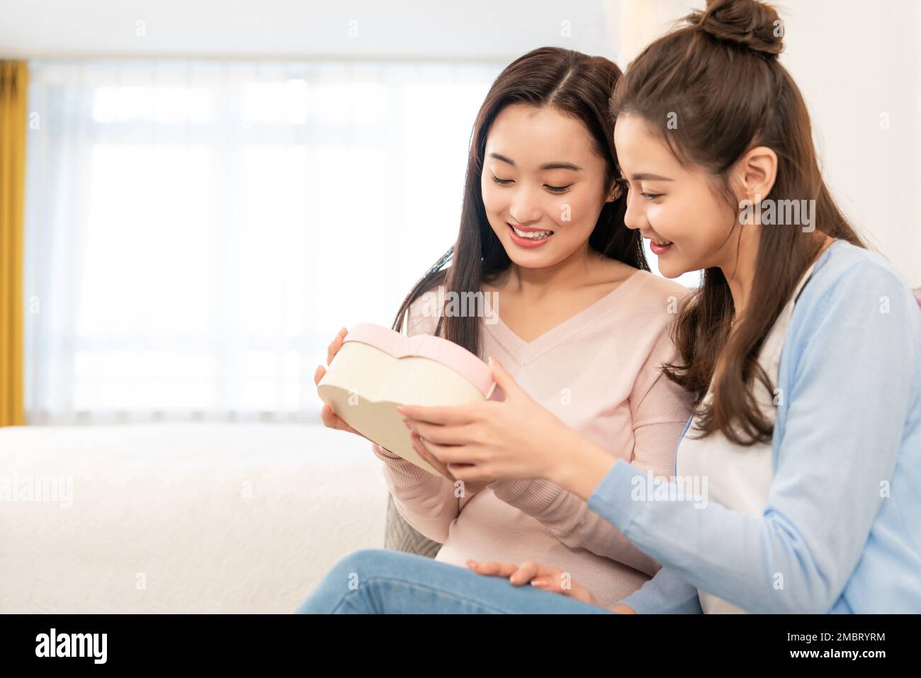 Pregnant women to family life Stock Photo - Alamy