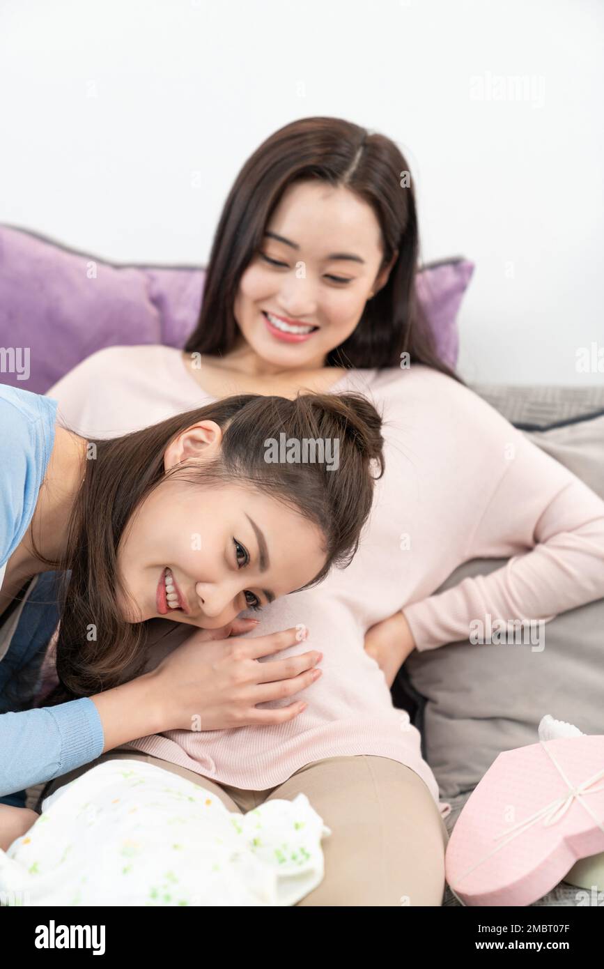 Pregnant women to family life Stock Photo - Alamy