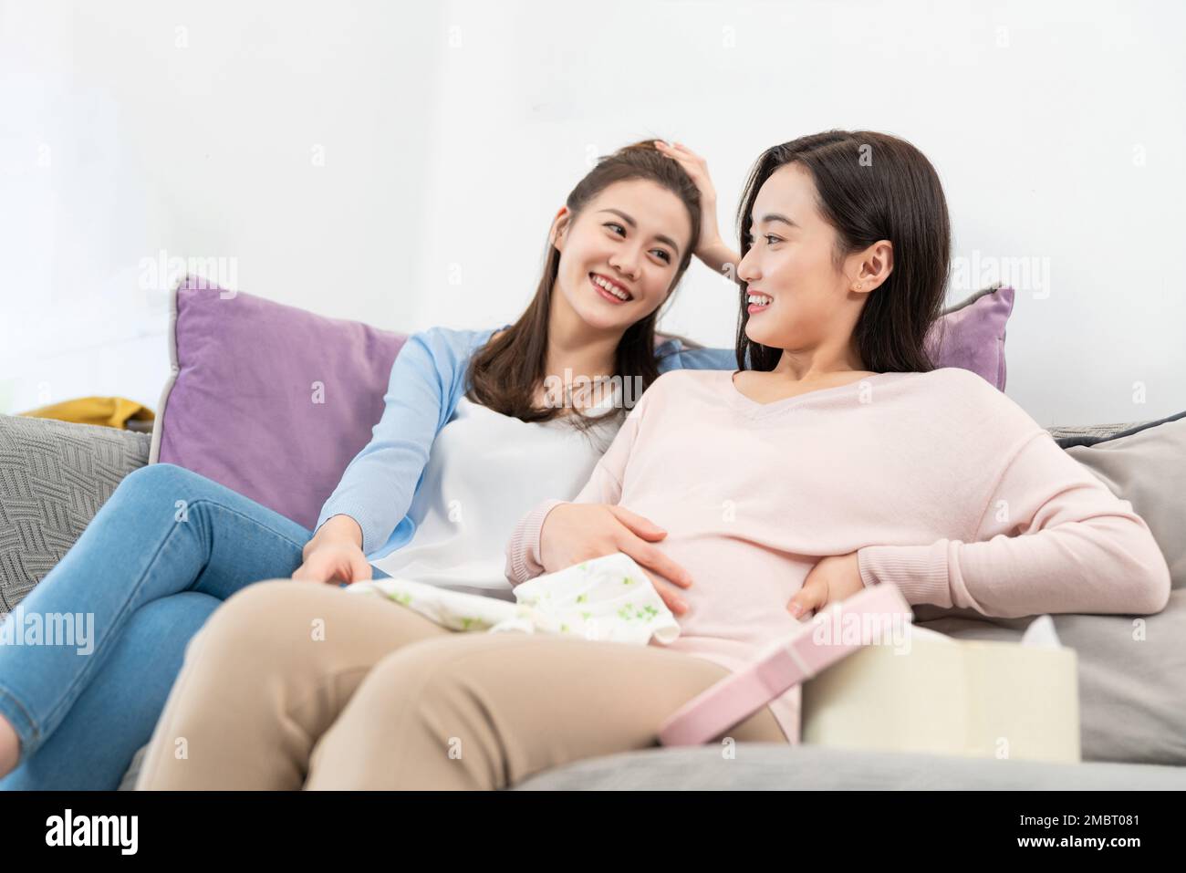 Pregnant women to family life Stock Photo - Alamy
