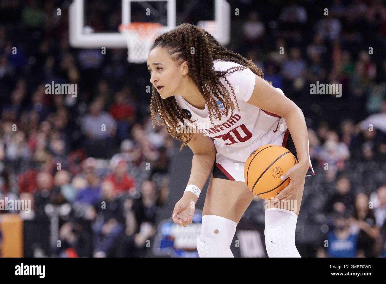 Stanford guard Haley Jones controls the ball during a college ...