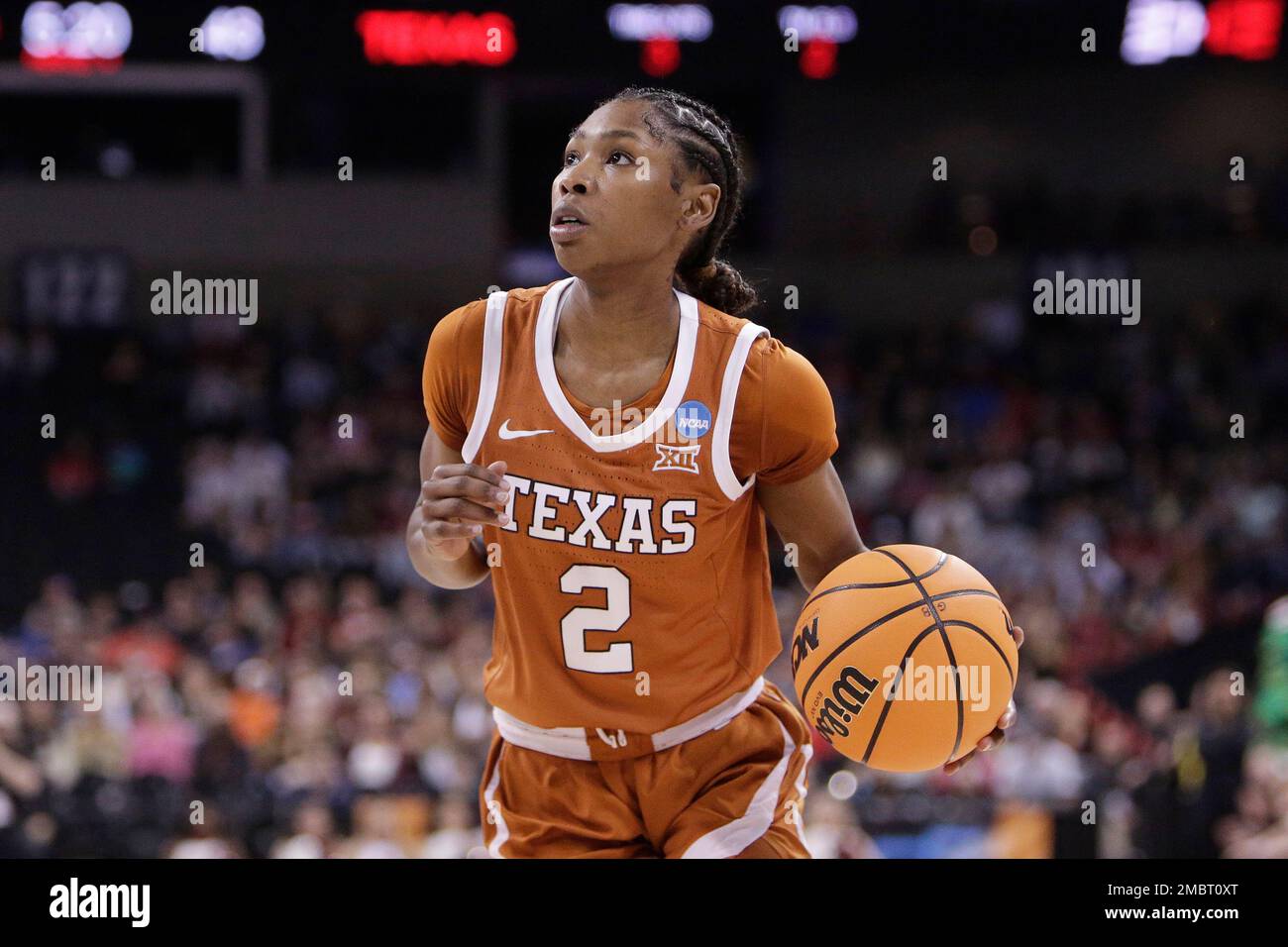 Texas guard Aliyah Matharu controls the ball during a college ...