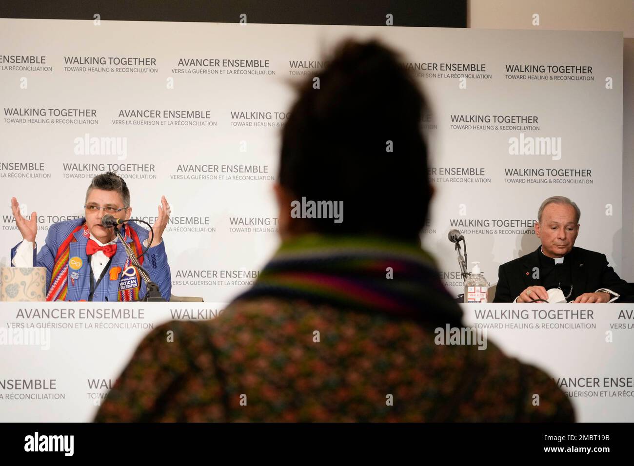 Pixie Wells, of the Metis community, left, flanked by Bishop Raymond ...