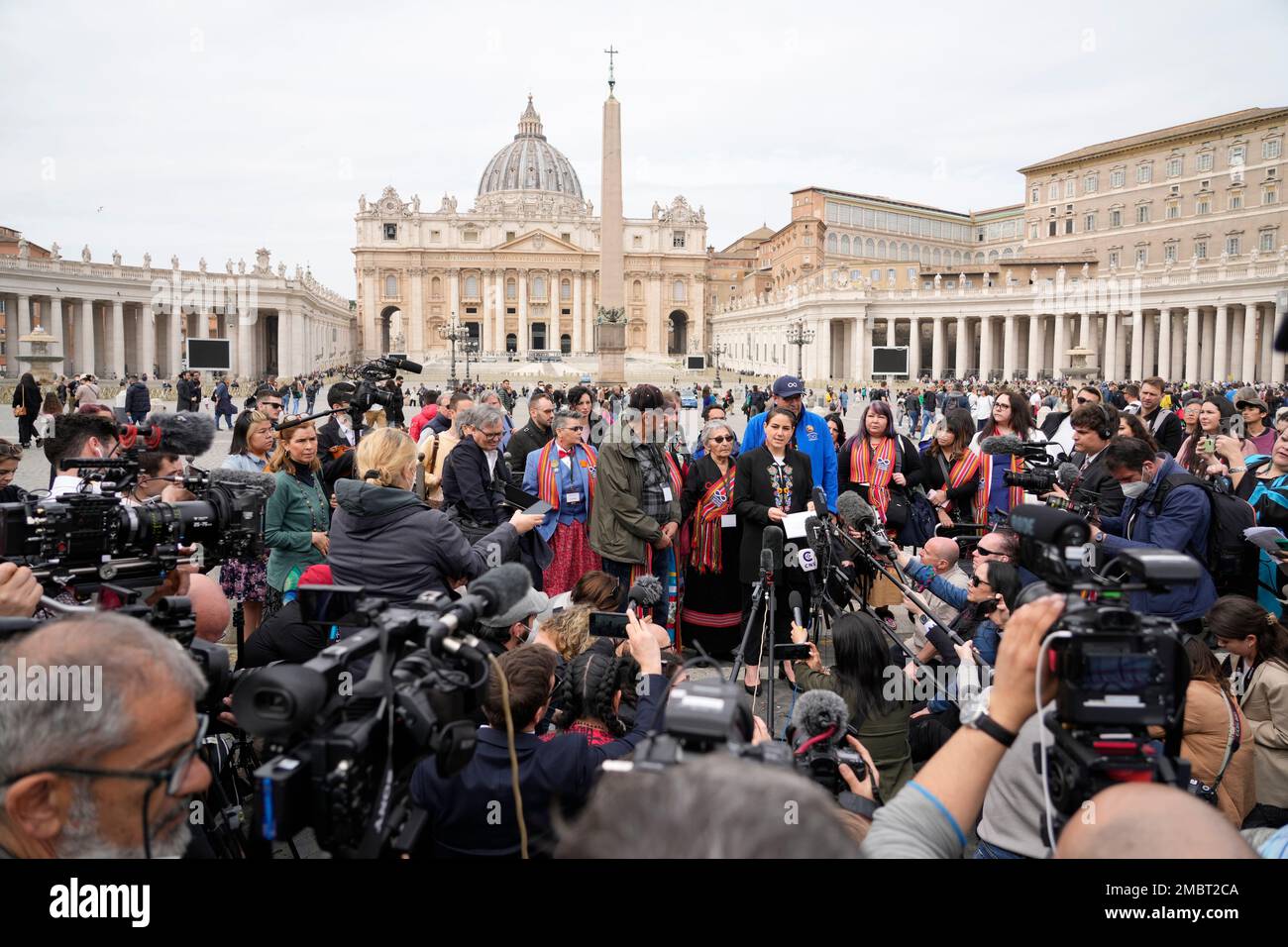President of the Metis community, Cassidy Caron, center, speaks to the ...