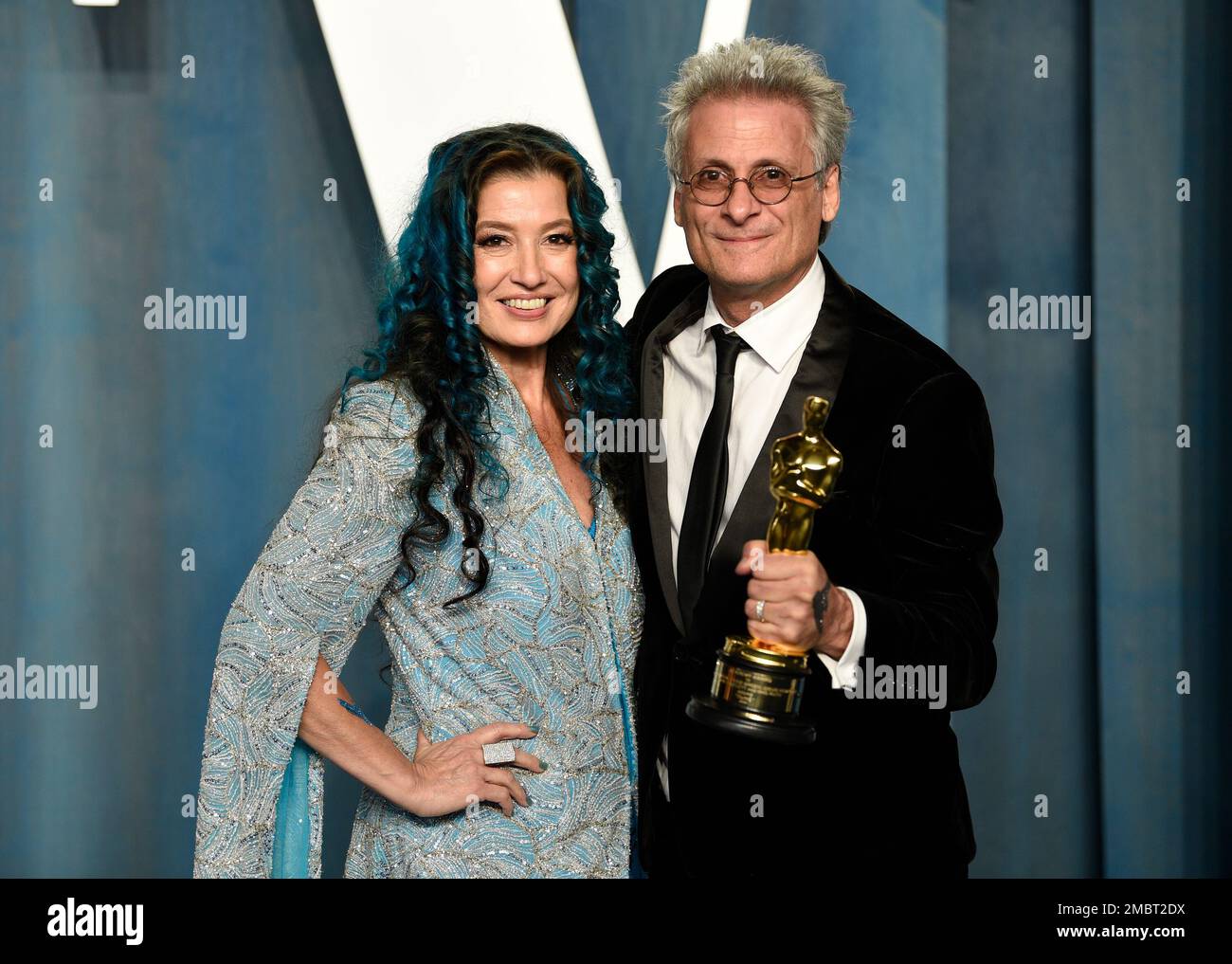 Ann Mangini, left, and Mark Mangini arrive at the Vanity Fair Oscar ...