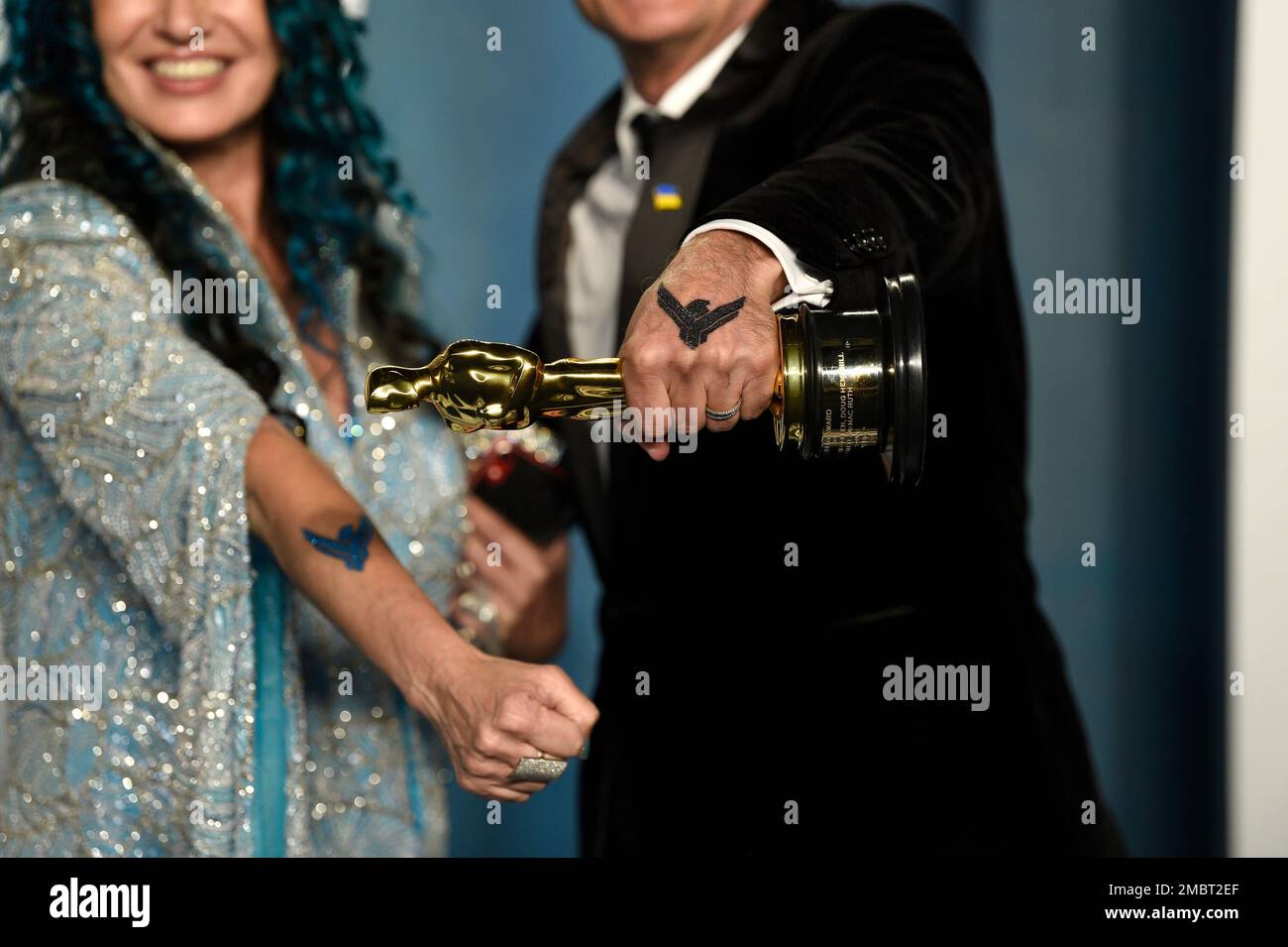 Ann Mangini, left, and Mark Mangini arrive at the Vanity Fair Oscar ...