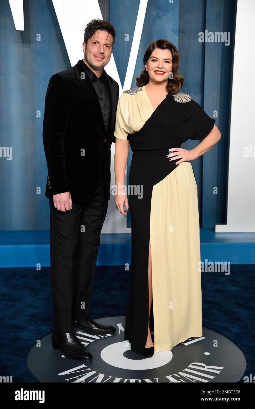 David Caspe, left, and Casey Wilson arrive at the Vanity Fair Oscar ...