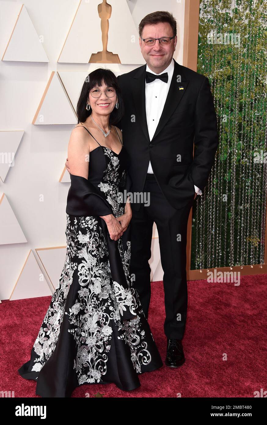 Ron Bartlett, right arrives at the Oscars on Sunday, March 27, 2022, at ...