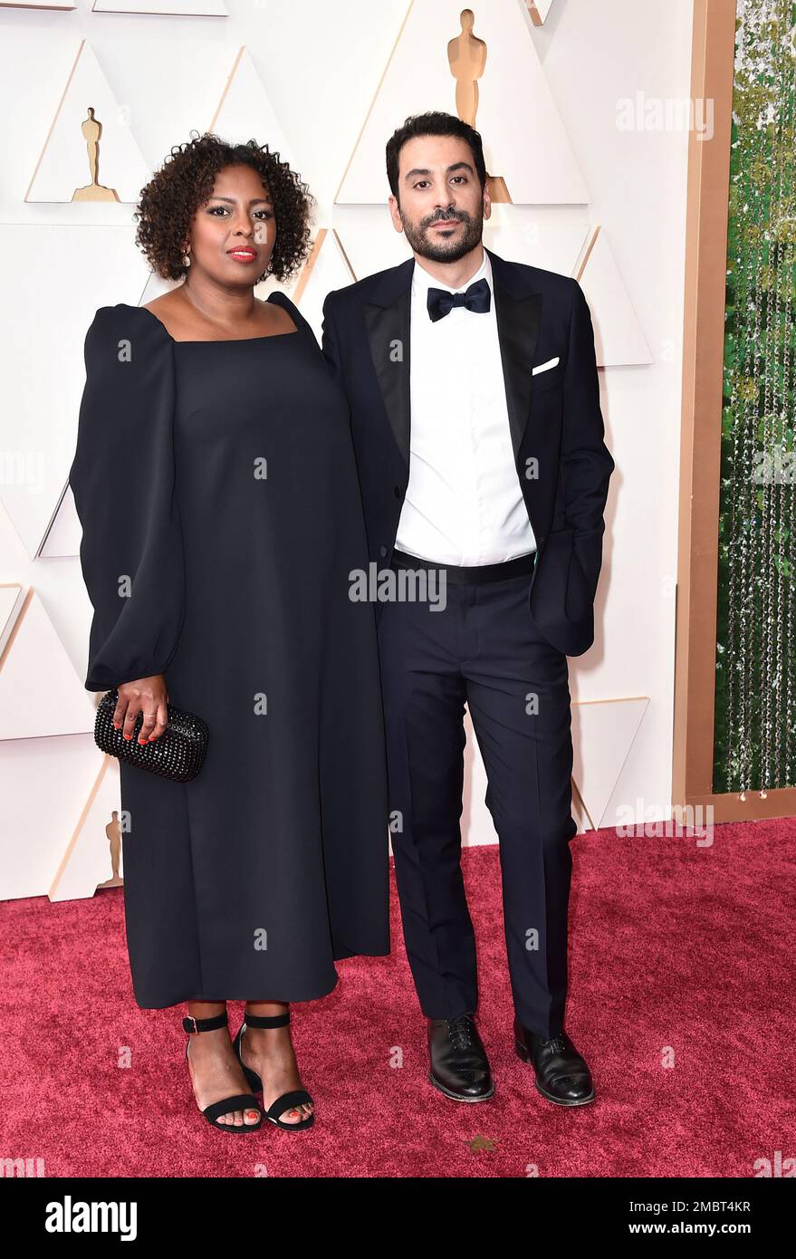 Idil Sciberras, left and Peter Sciberras arrive at the Oscars on Sunday ...