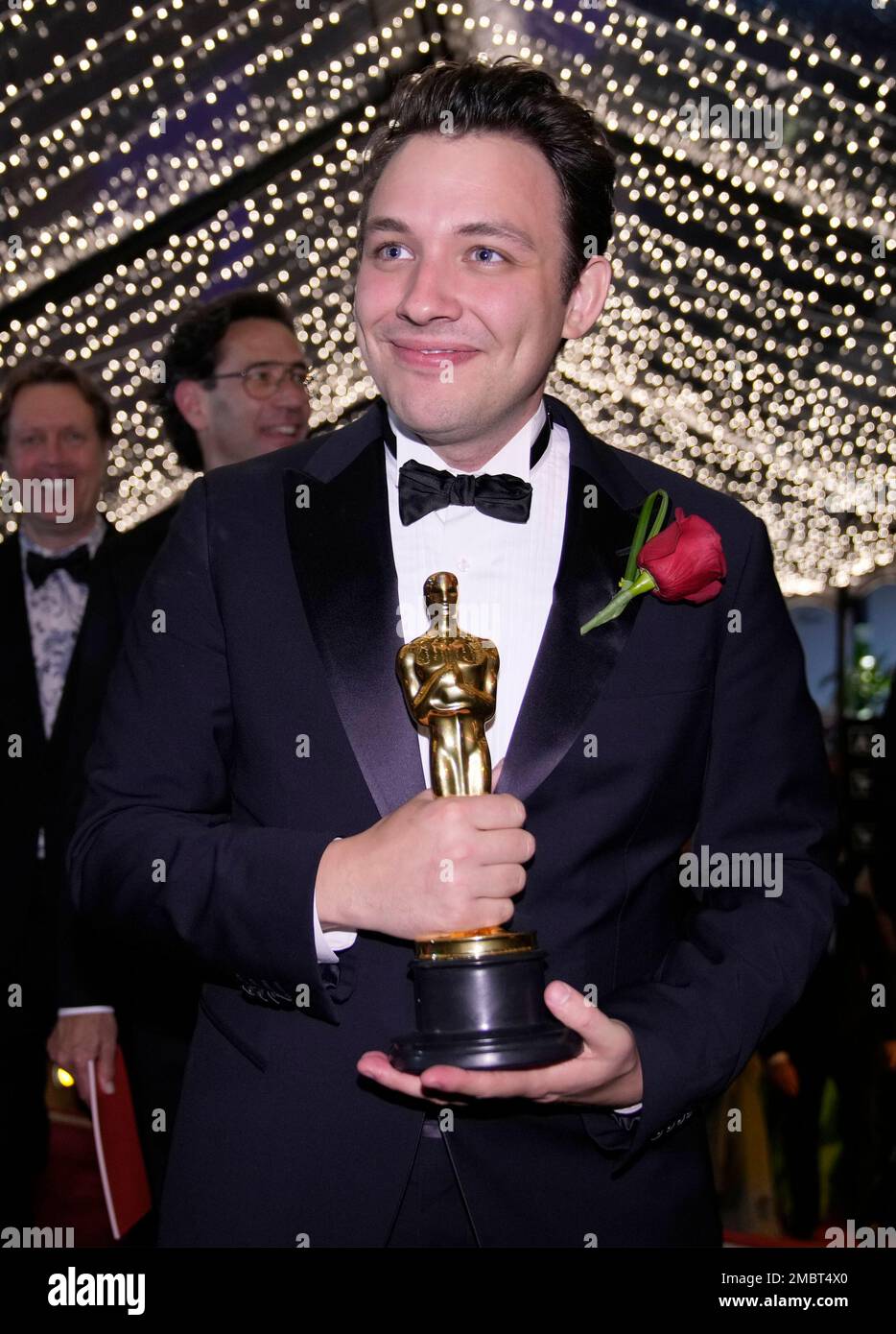 Ben Proudfoot holds his award for best documentary short subject for ...