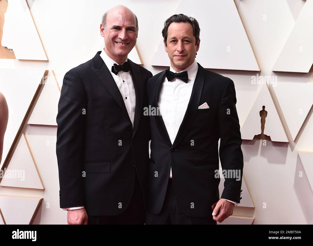 Matthew Greenfield, left, and David Greenbaum arrive at the Oscars on ...