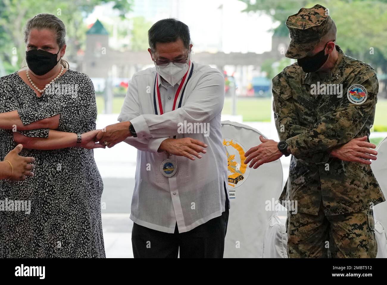 From left, U.S. Charge d'Affairs Heather Variava, National Defense ...
