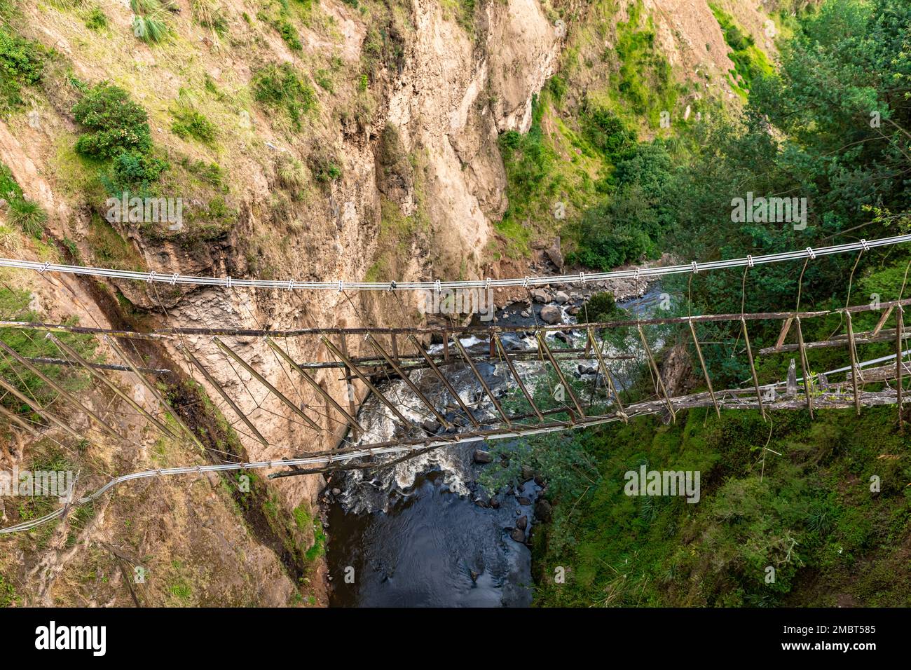 old suspension bridge over the chasm Stock Photo - Alamy