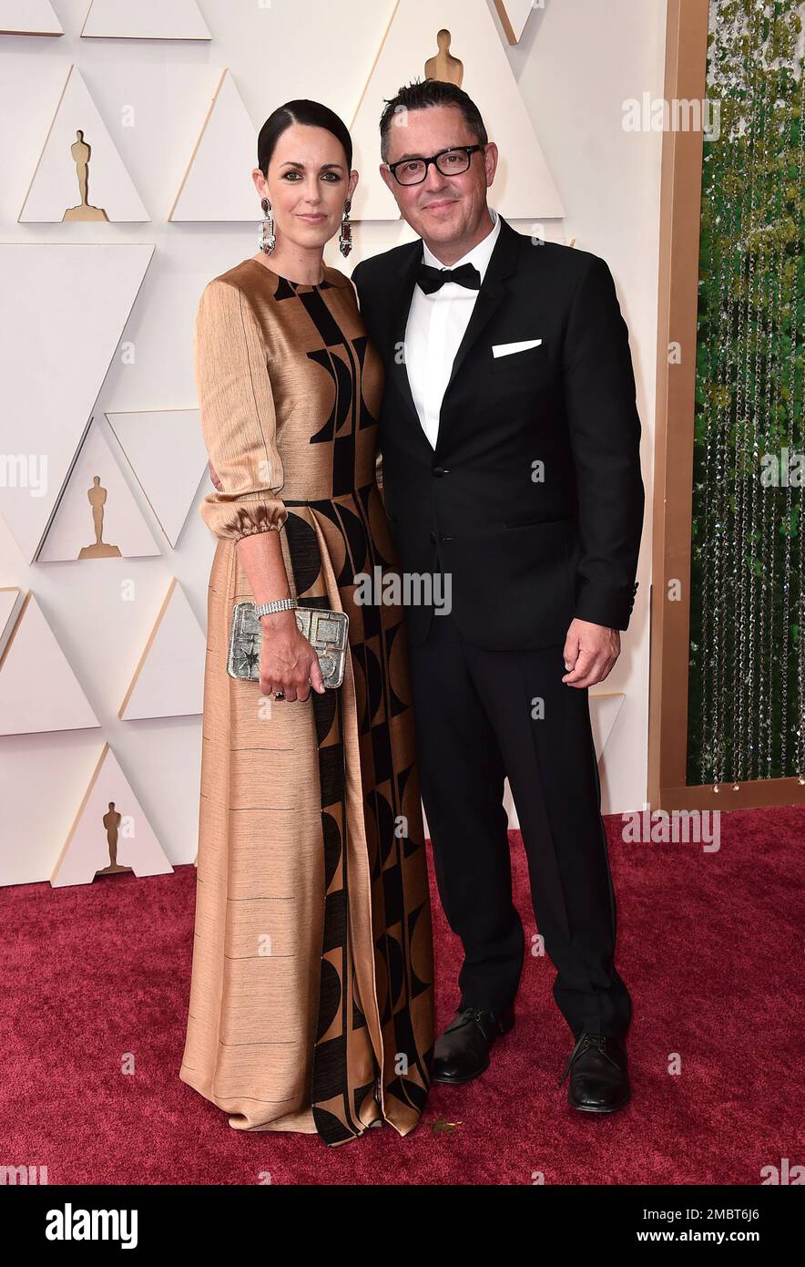Jodie Fried, left, and Greig Fraser arrive at the Oscars on Sunday ...
