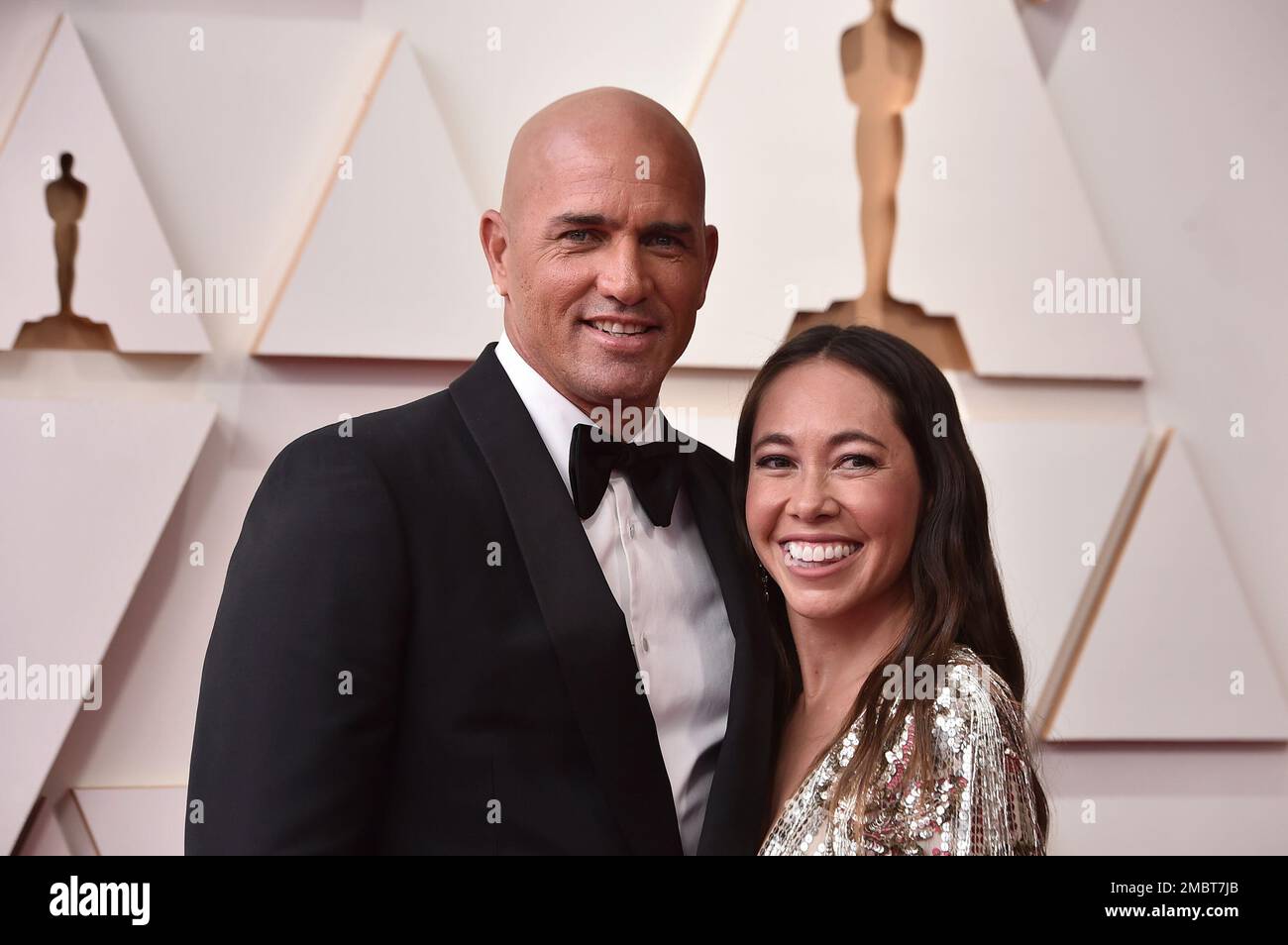 Kelly Slater, left, and Kalani Miller arrive at the Oscars on Sunday ...