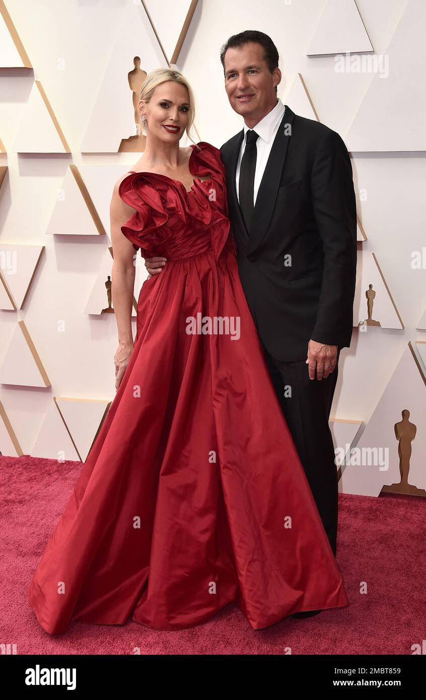 Molly Sims, left, and Scott Stuber arrive at the Oscars on Sunday ...