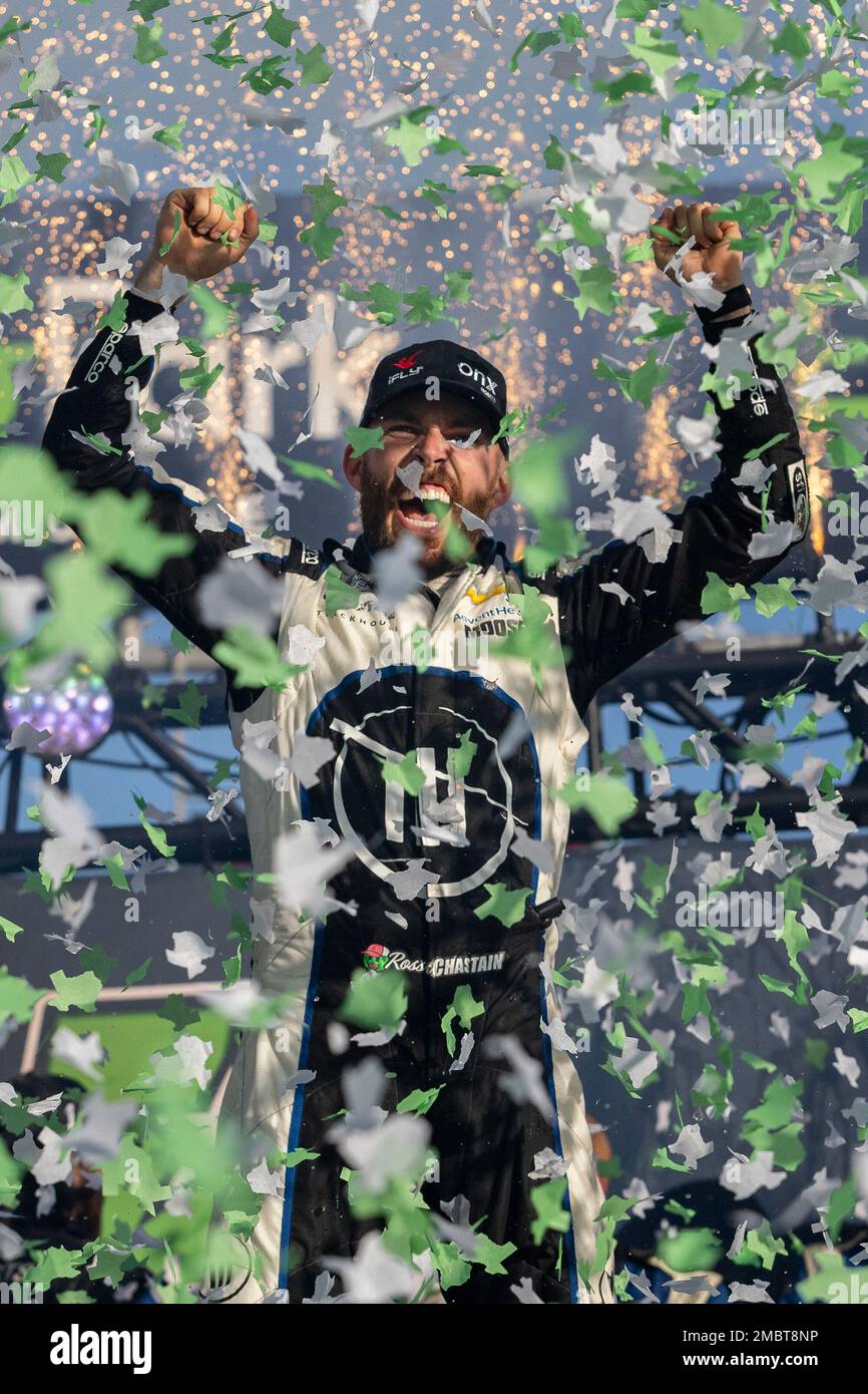 Ross Chastain celebrates after winning a NASCAR Cup Series auto race at ...