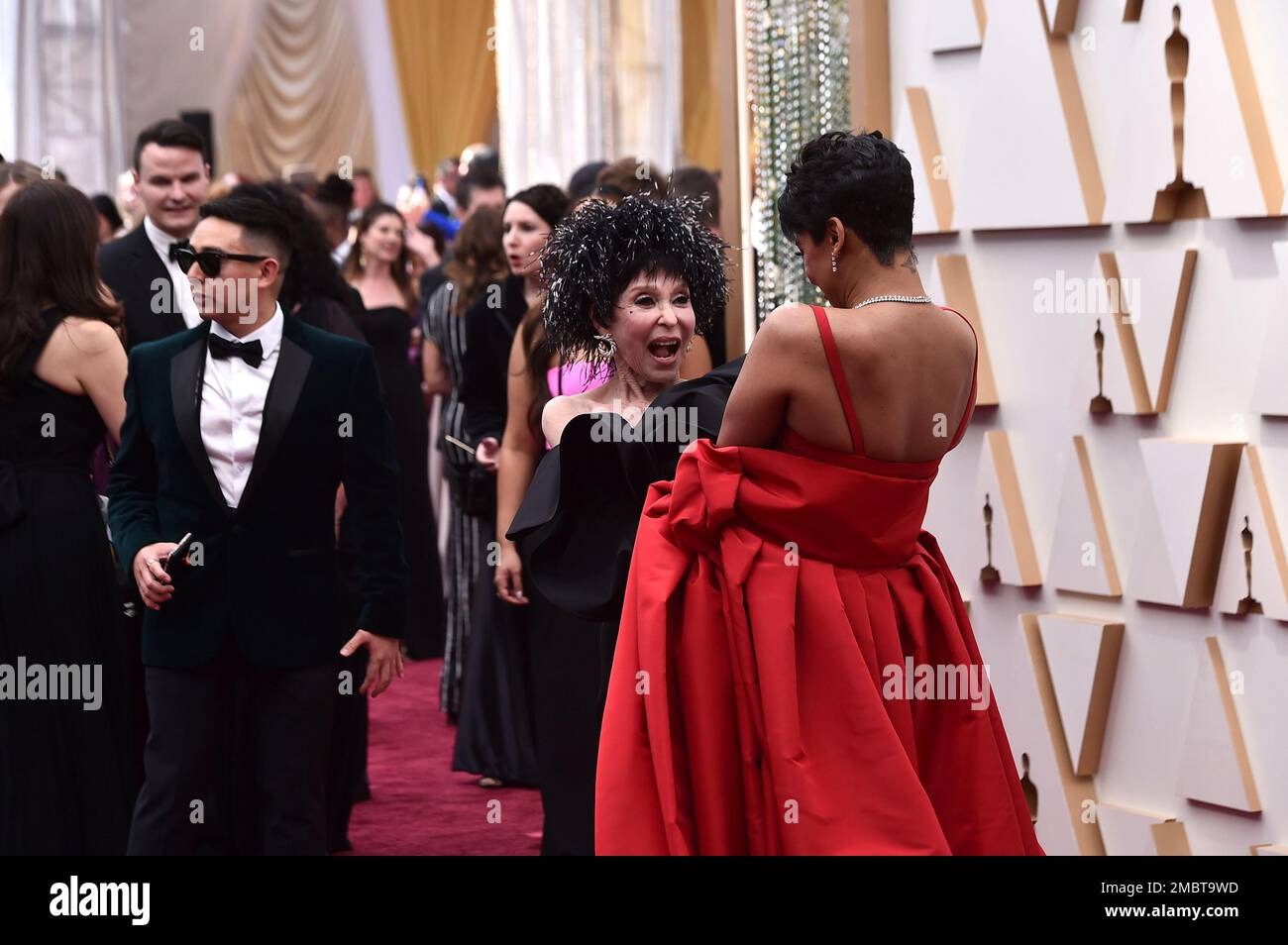 Rita Moreno, left, and Ariana DeBose arrive at the Oscars on Sunday ...