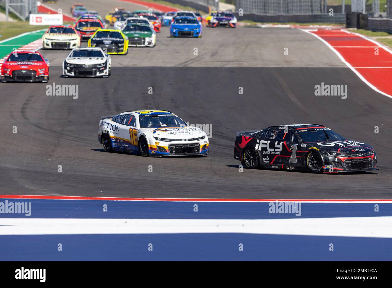 AJ Allmendinger (16) and Ross Chastain (1) steer out of Turn 12 during ...