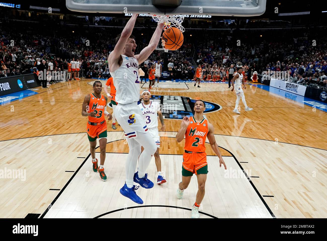 Kansas' Christian Braun dunks during the scond half of a college ...