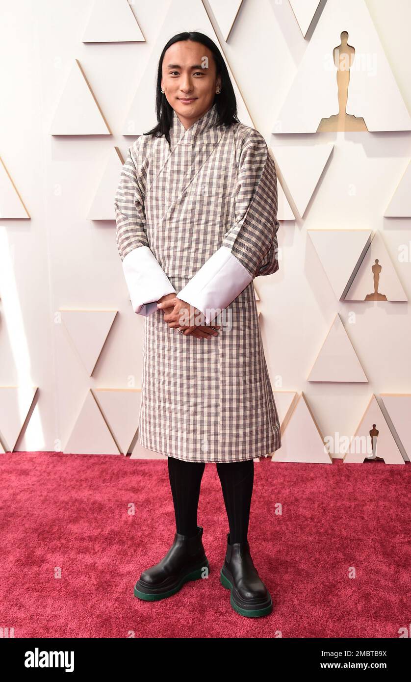 Pawo Choyning Dorji arrives at the Oscars on Sunday, March 27, 2022, at ...