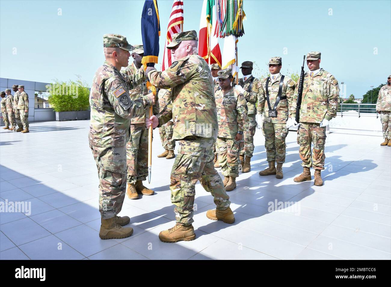 Right, U.S. Army Lt. Col Brian M. Travis outgoing commander of Allied ...