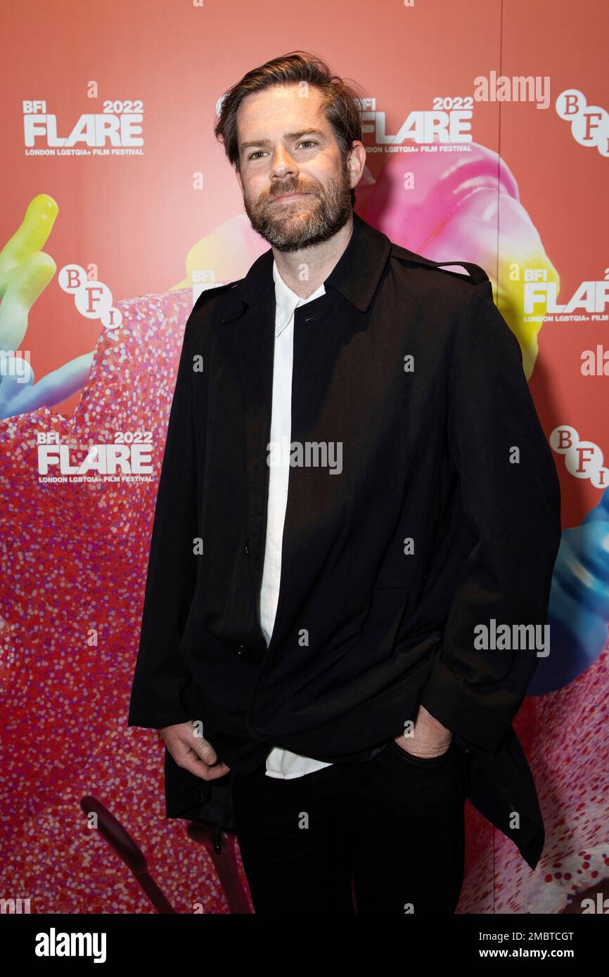 Brian Robertson poses for photographers upon arrival at the screening ...