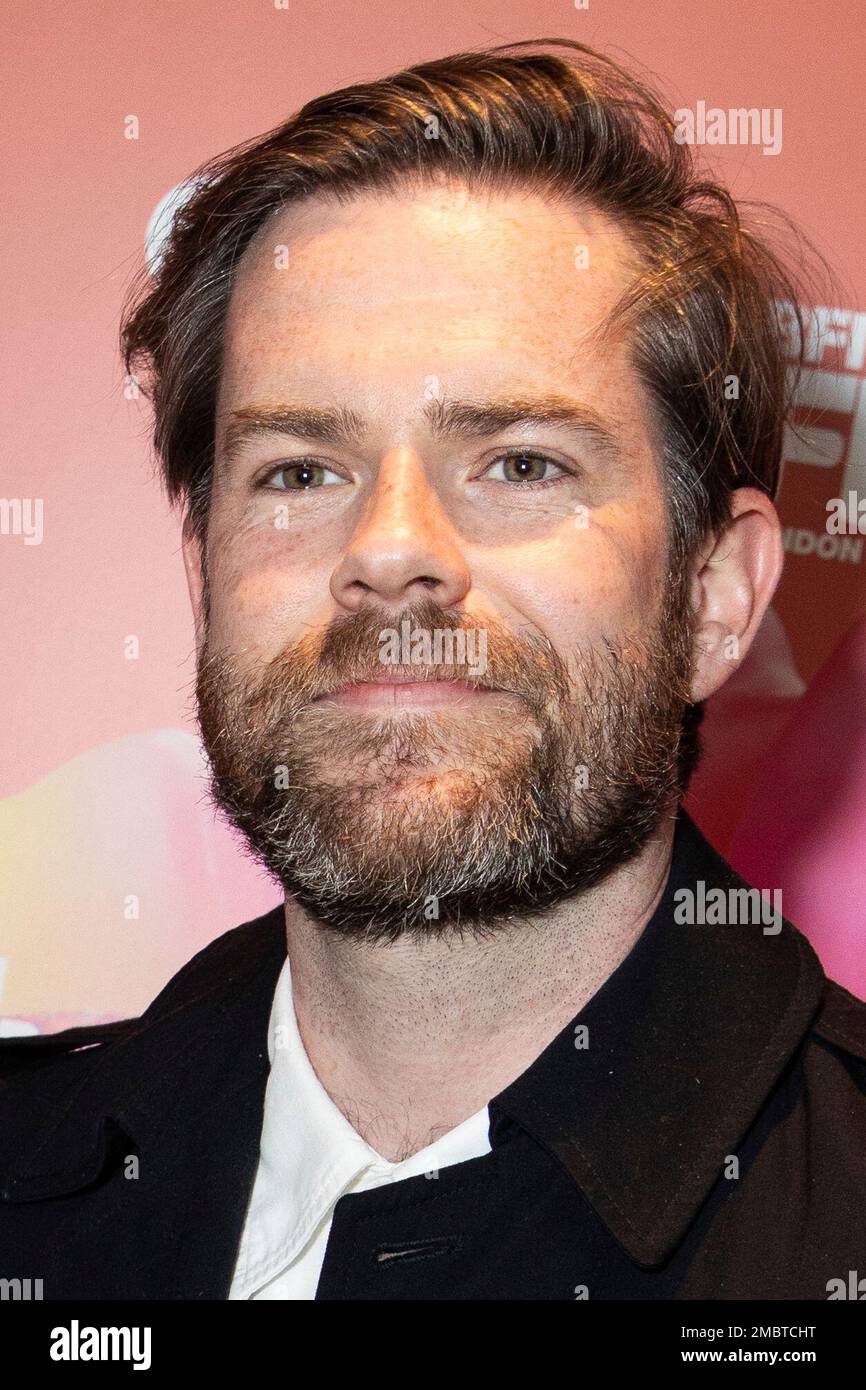 Brian Robertson poses for photographers upon arrival at the screening ...