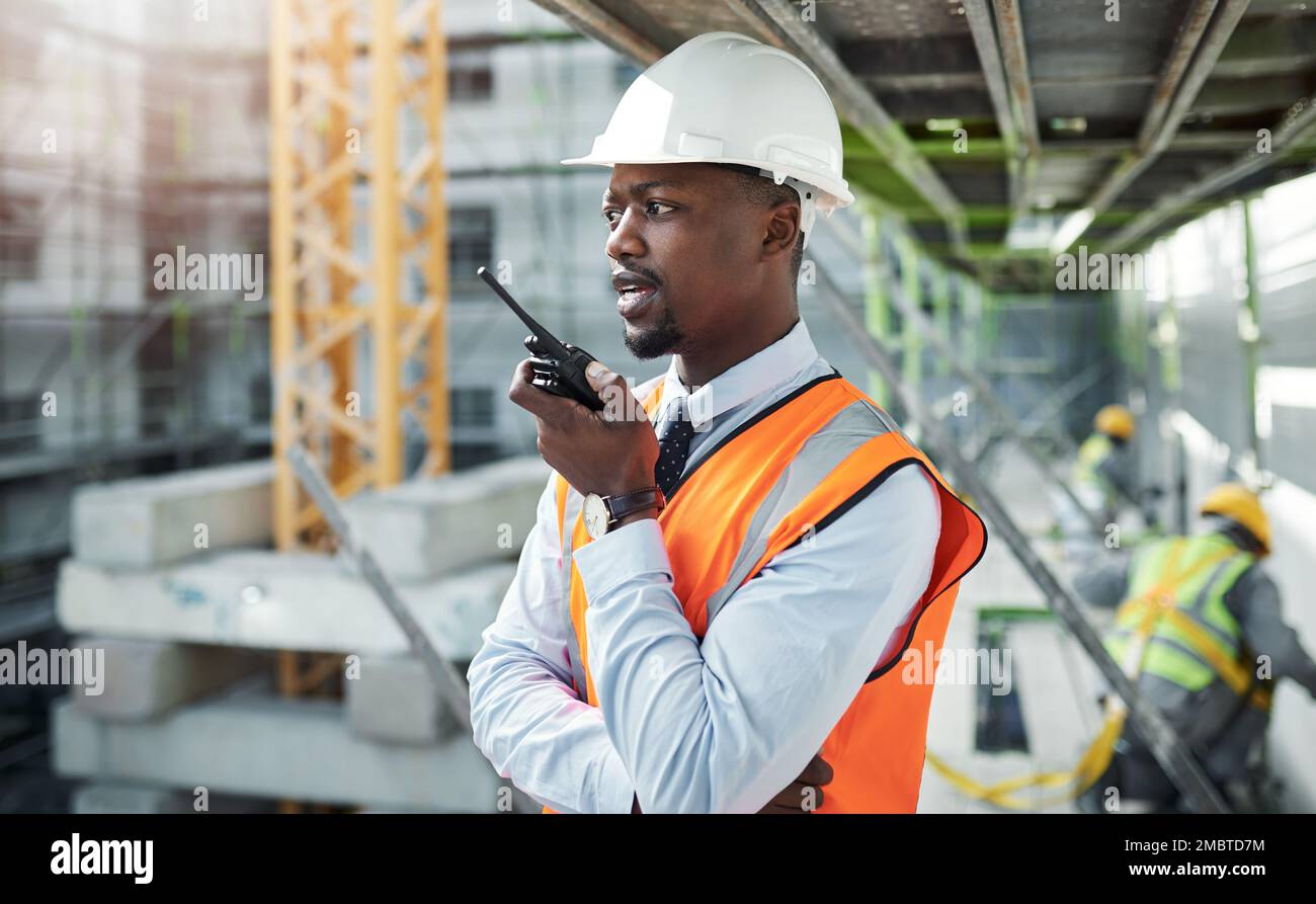 Effective communication for better construction. a young man using a ...