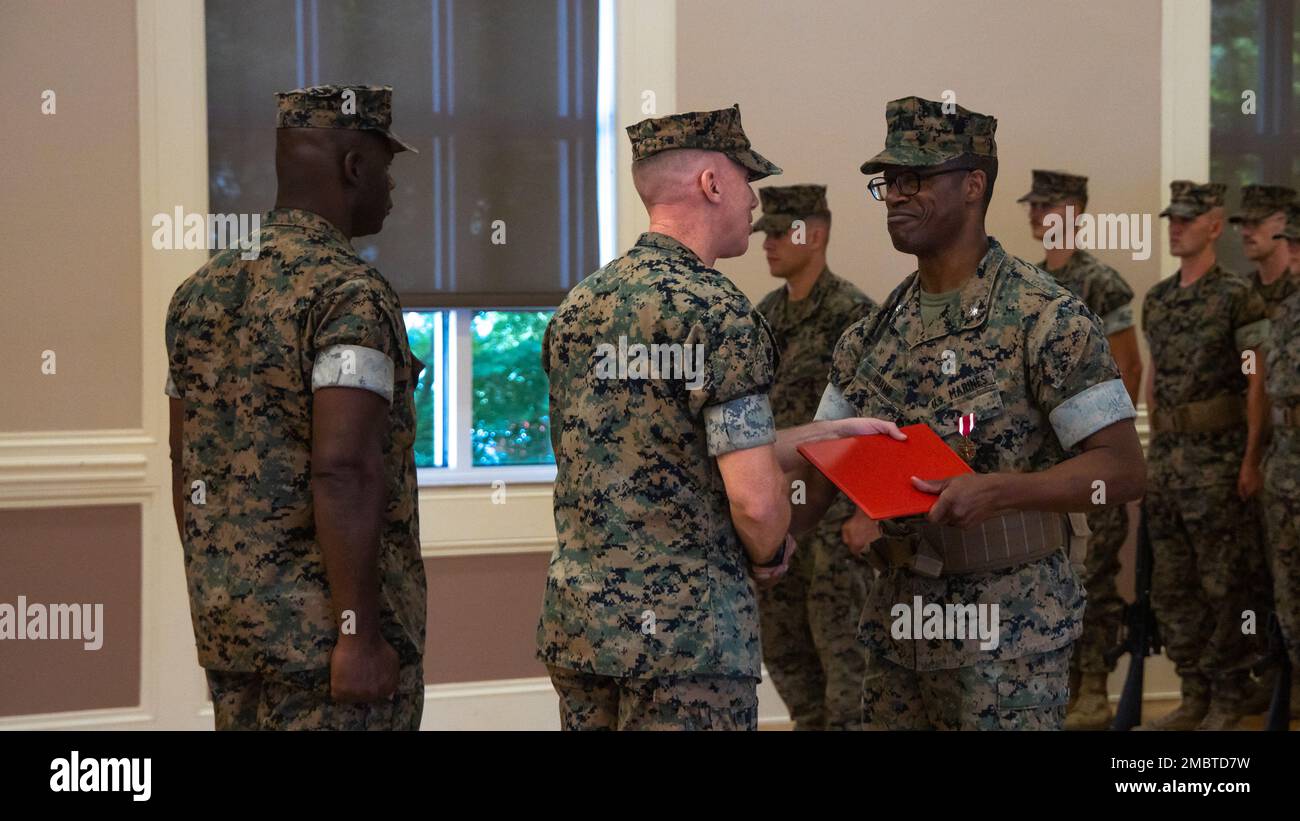 U.S. Marine Corps Lt. Col. Agur Adams, outgoing commanding officer of ...