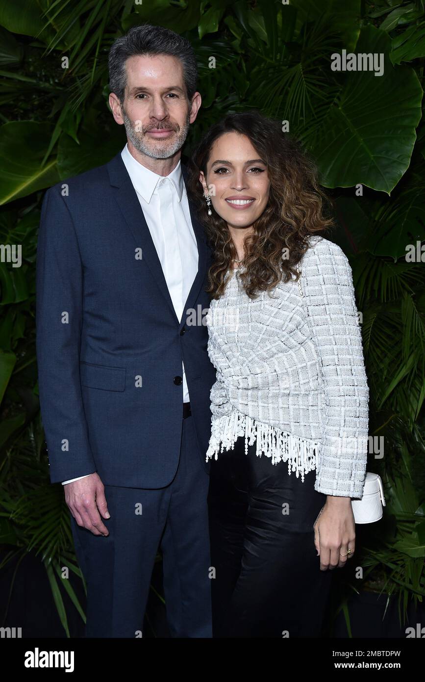 Simon Kinberg, left, and Cleo Wade arrive at the Chanel 13th annual pre-Oscar Awards Dinner on ...