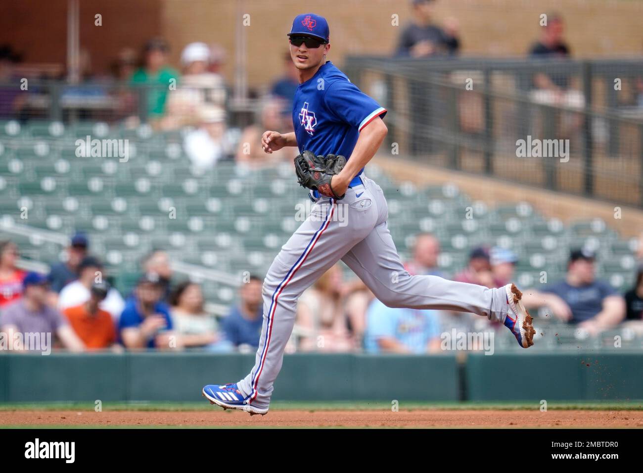 Texas Rangers shortstop Corey Seager runs to cover third base during ...