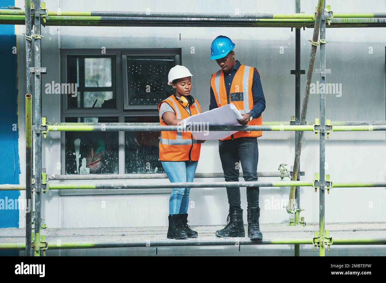 Theres room for expansion here. a young man and woman going over ...