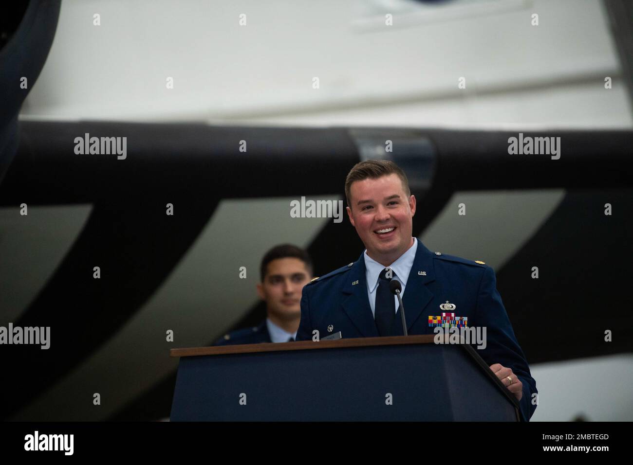 Maj. Ryan Coker, right, 436th Contracting Squadron commander provides ...