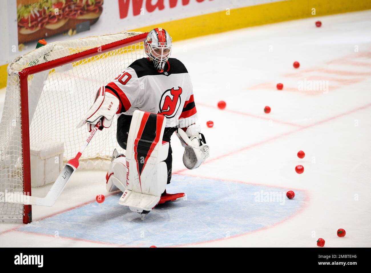 New Jersey Devils goaltender Nico Daws (50) stands on the ice as ...