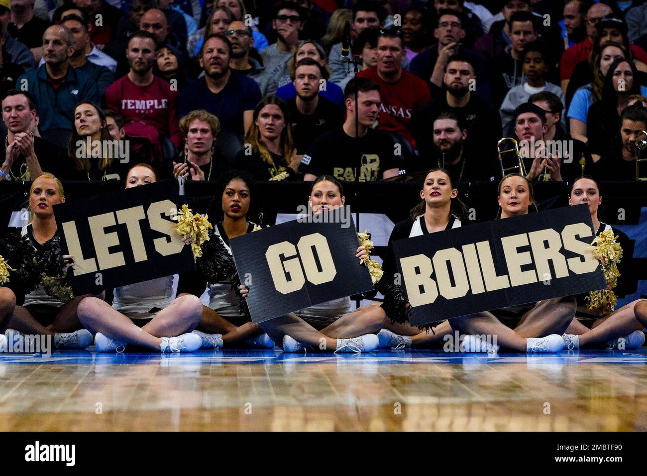 Purdue 's cheerleaders cheer their school on during the first half of a ...