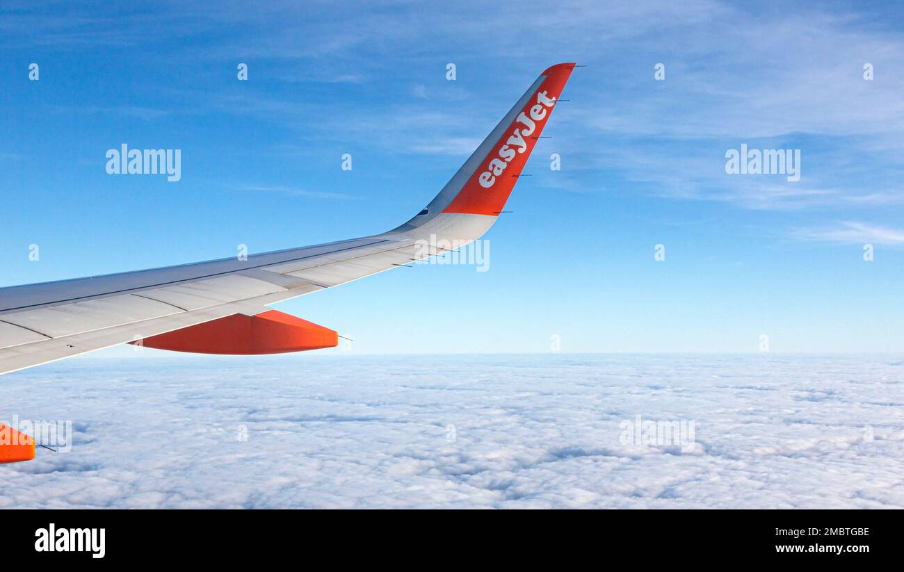 DECEMBER 12. 2019: Easy Jet flying above the clouds. The second plane ...