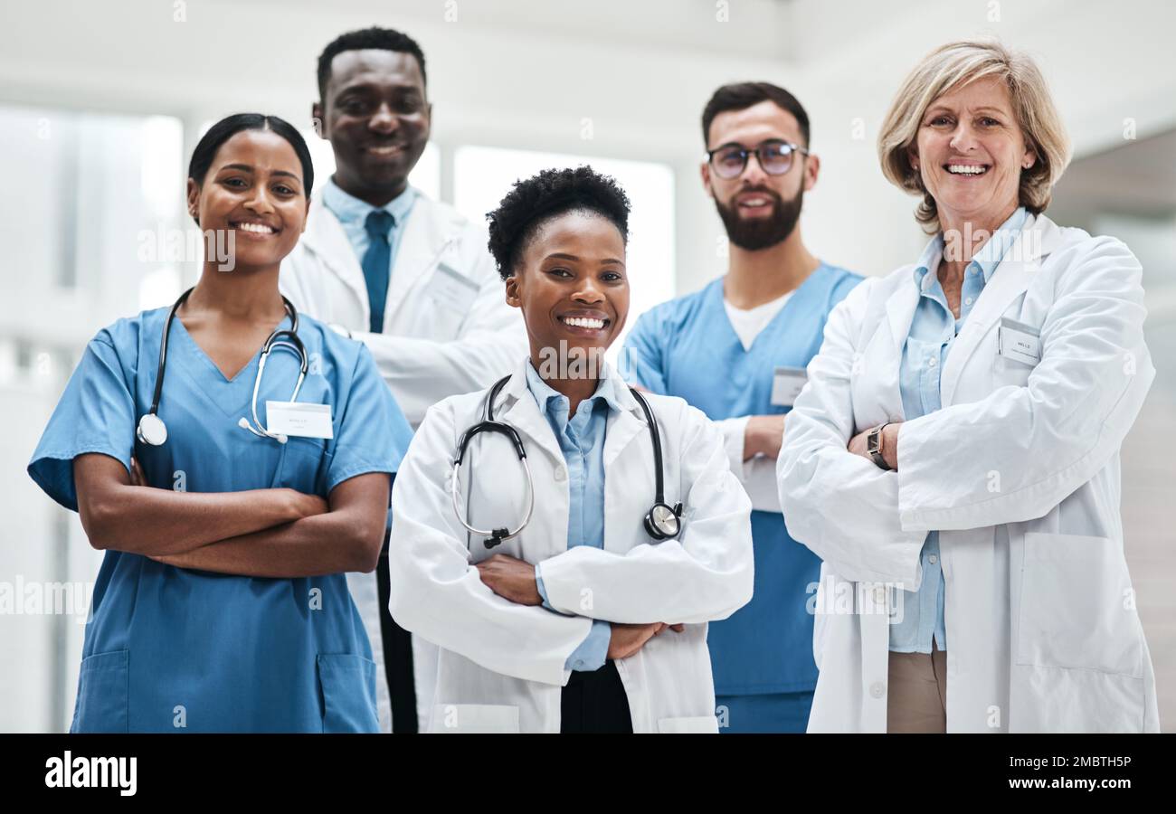 We provide affordable, safe and effective healthcare services to all. Portrait of a group of ...