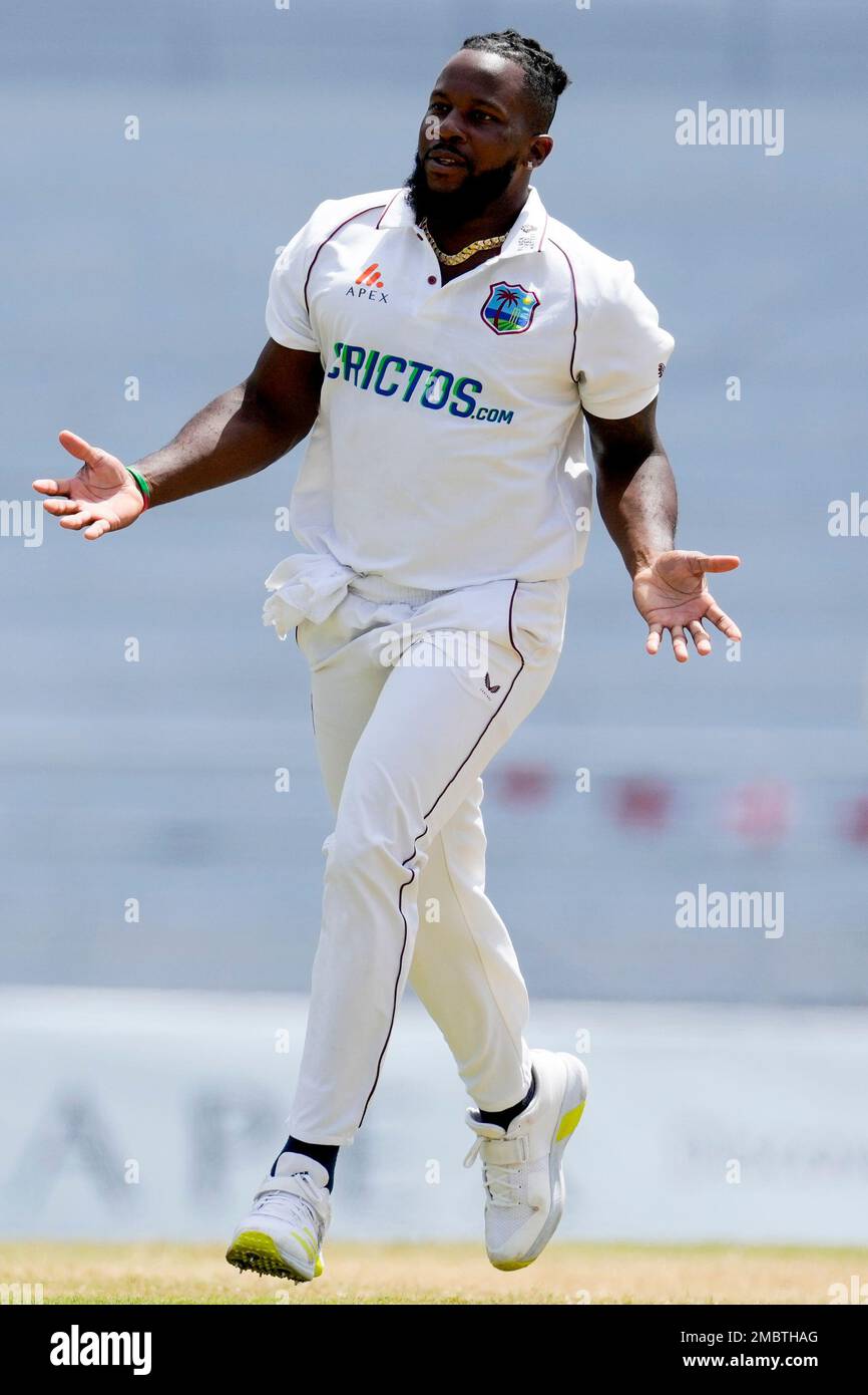 West Indies' Kyle Mayers celebrates taking the wicket of England's Dan ...
