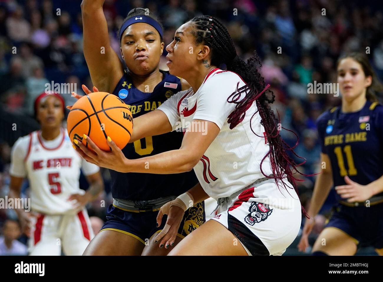 North Carolina State forward Jakia Brown-Turner (11) goes to the basket ...