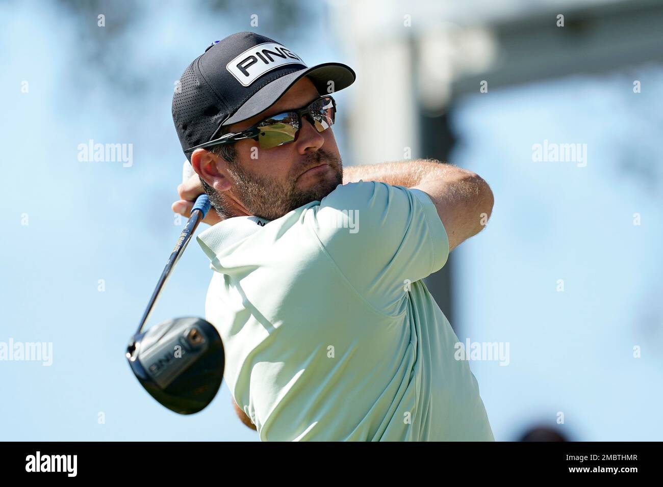 Corey Conners tees off on the 12th hole during the round of 16 of the ...