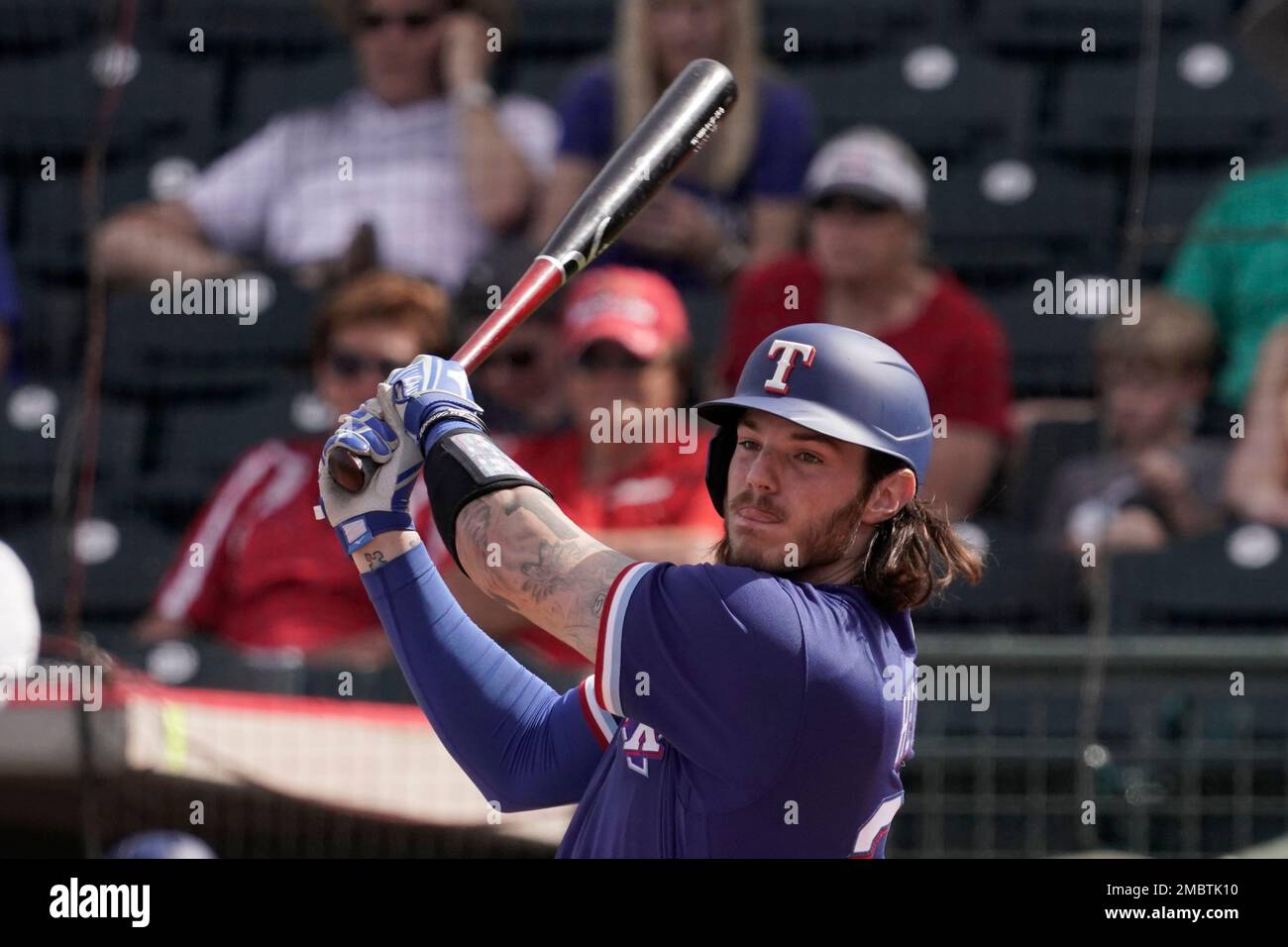 Texas Rangers' Jonah Heim bats during the fifth inning of a spring ...
