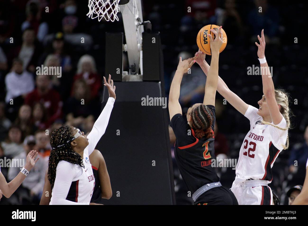 Stanford forward Cameron Brink (22) blocks a shot by Maryland forward ...