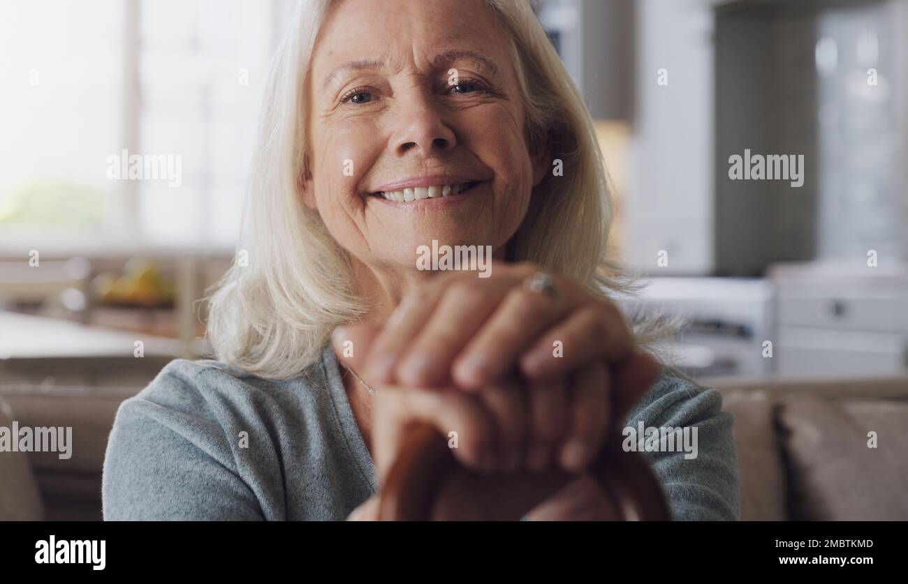 Taking Each Day As It Comes With A Smile A Senior Woman Sitting Alone