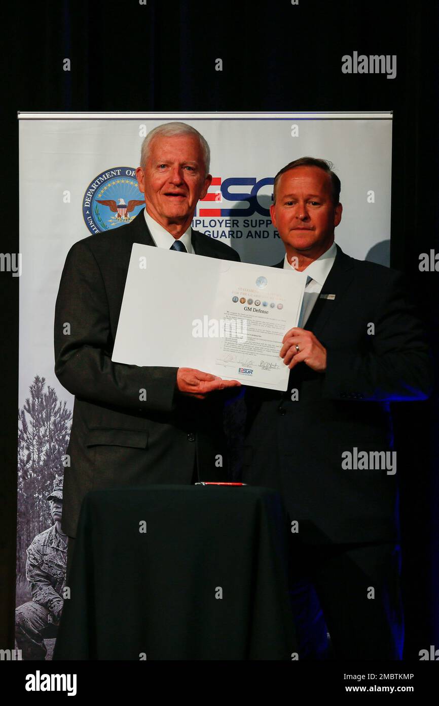 Steve duMont, right, CEO of GM Defense, and Ron Bogle, national ...