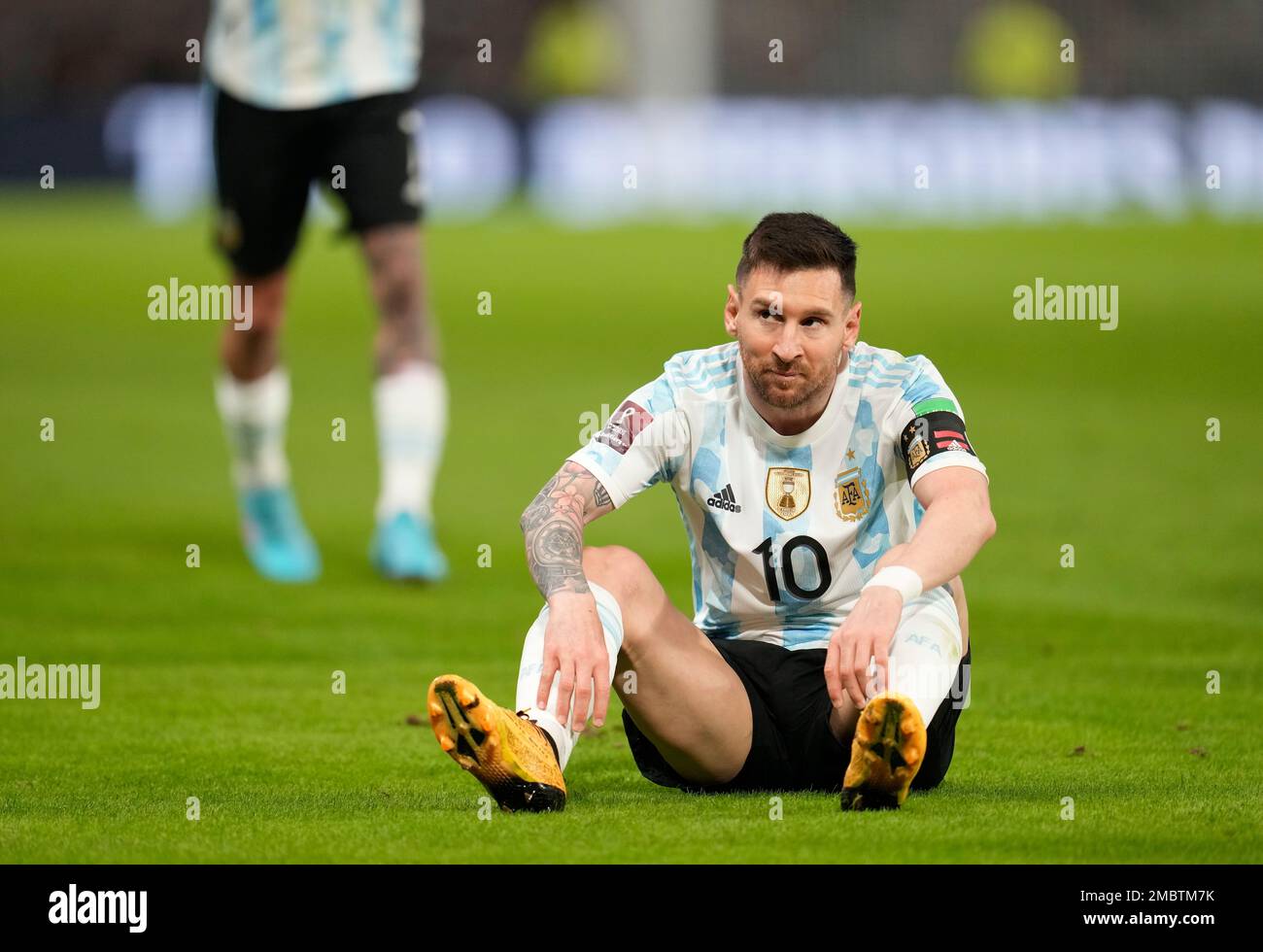 Argentina's Lionel Messi reacts after falling down on the pitch during ...